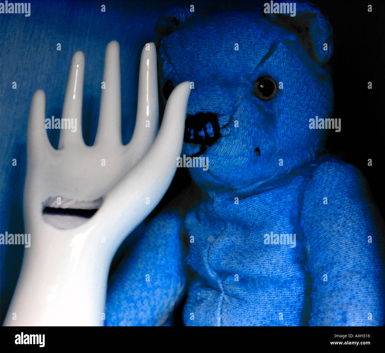 Teddy bear and hand Stock Photo - Alamy