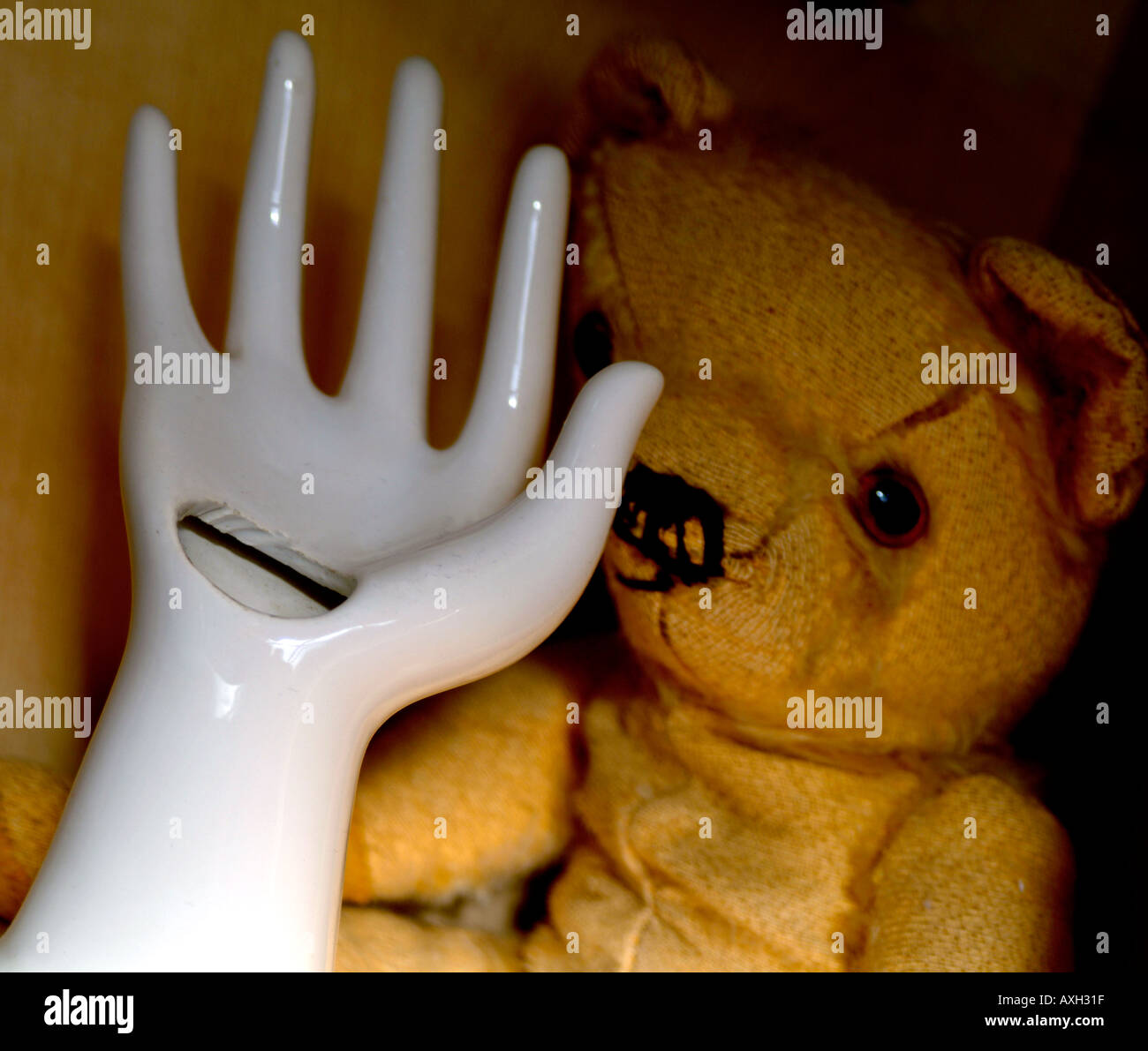 Teddy bear and hand Stock Photo - Alamy