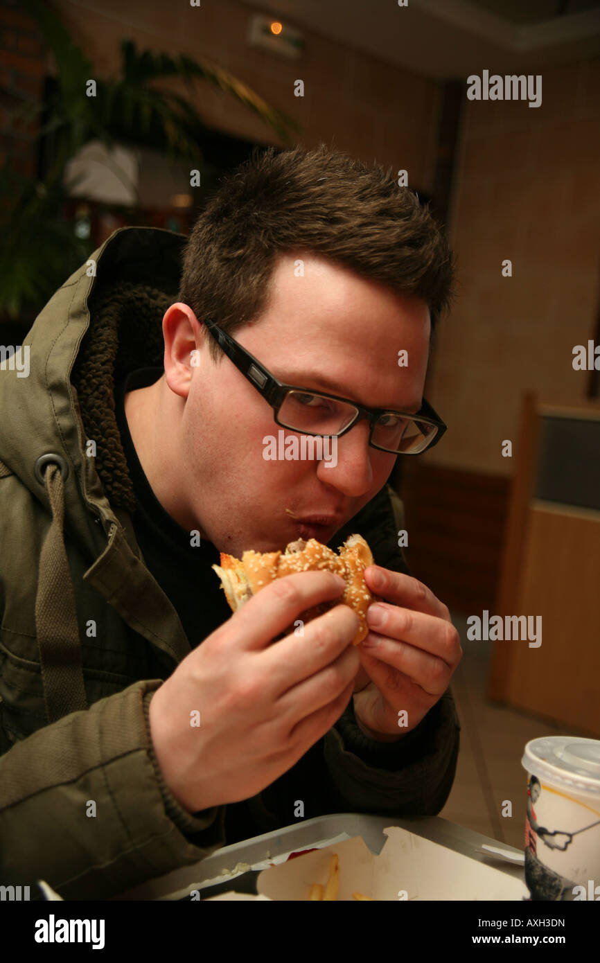 Man eating Burger Stock Photo - Alamy