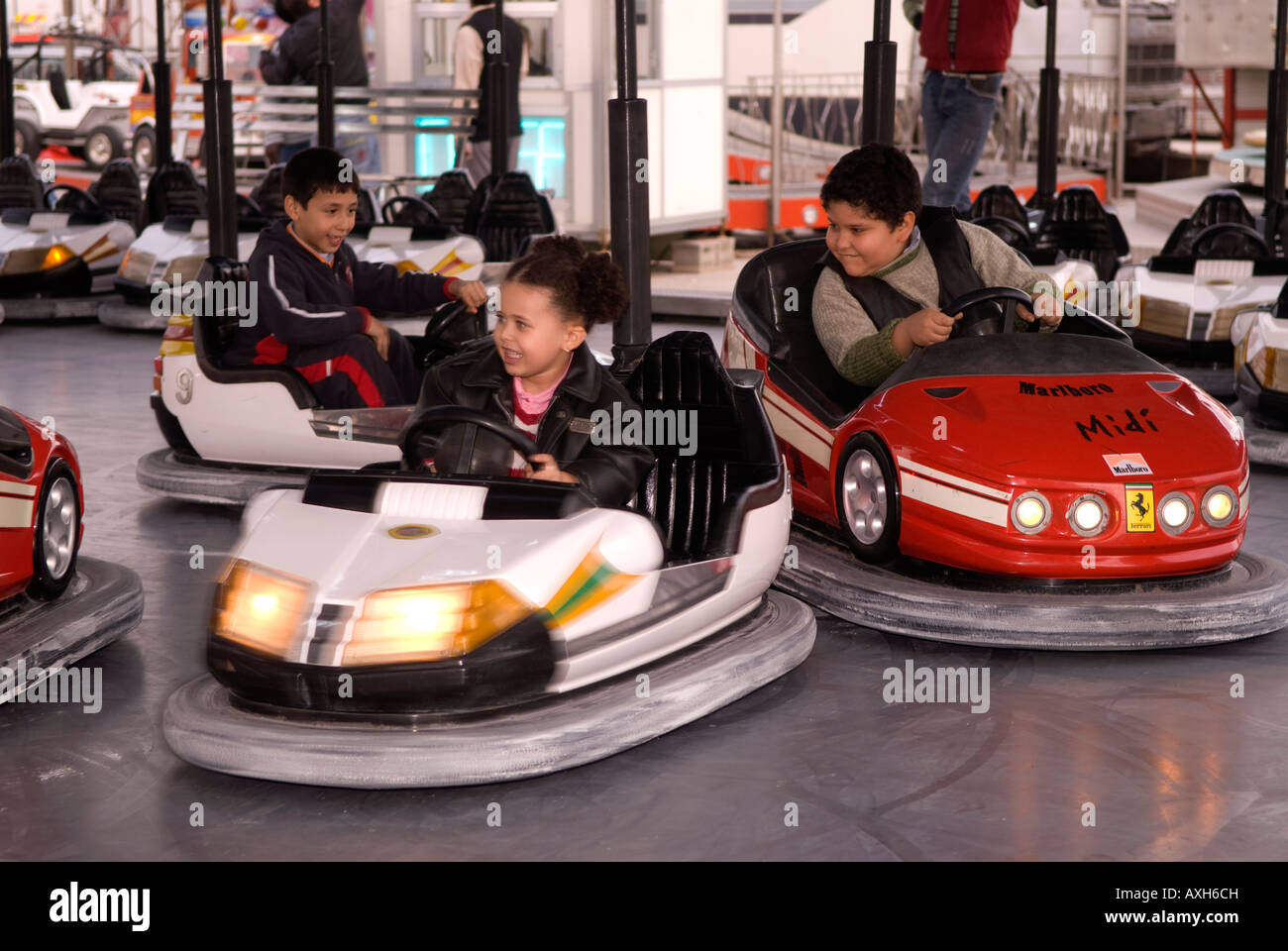 Libyan children enjoying an evening at the fun fair, Tripoli, Libya ...