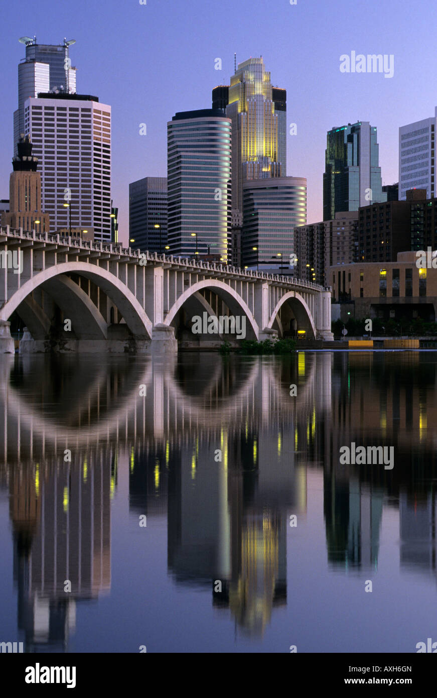 THIRD AVENUE BRIDGE SPANS THE MISSISSIPPI RIVER; SKYLINE OF MINNEAPOLIS ...