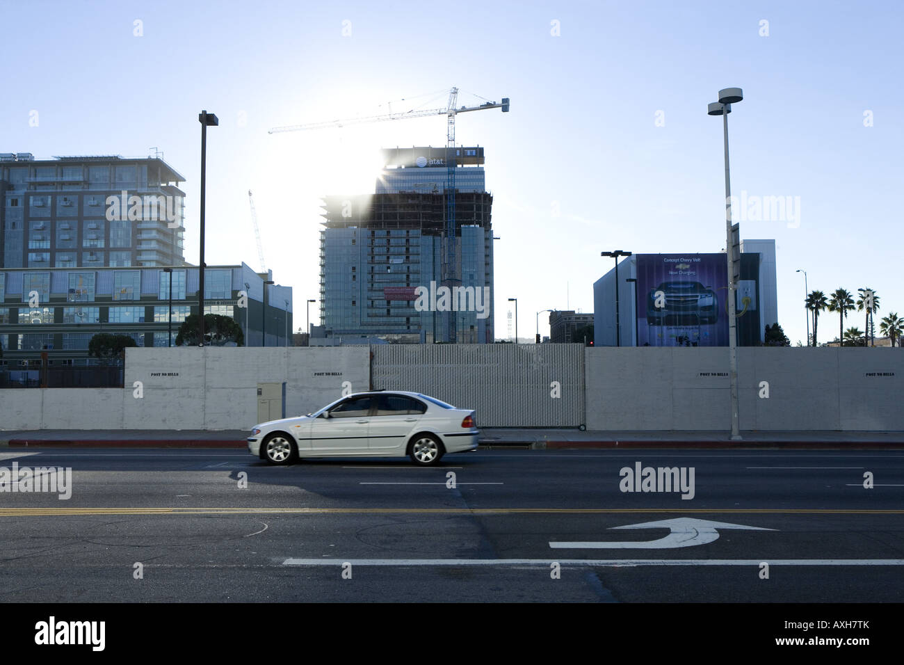 Car driving by construction site Stock Photo - Alamy