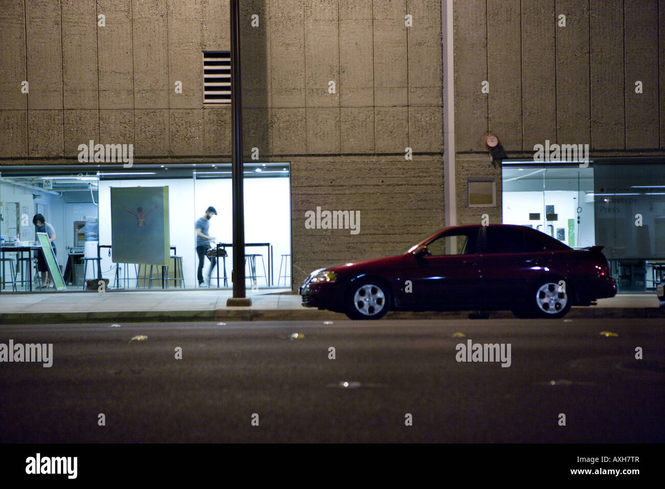 People working in lower level of office building Stock Photo - Alamy