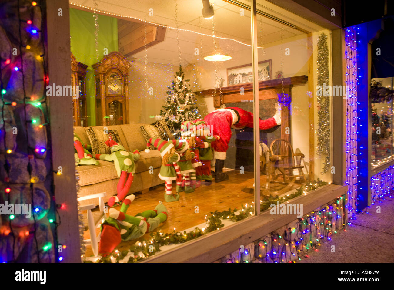 Looking through shop window at christmas ornaments Stock Photo - Alamy