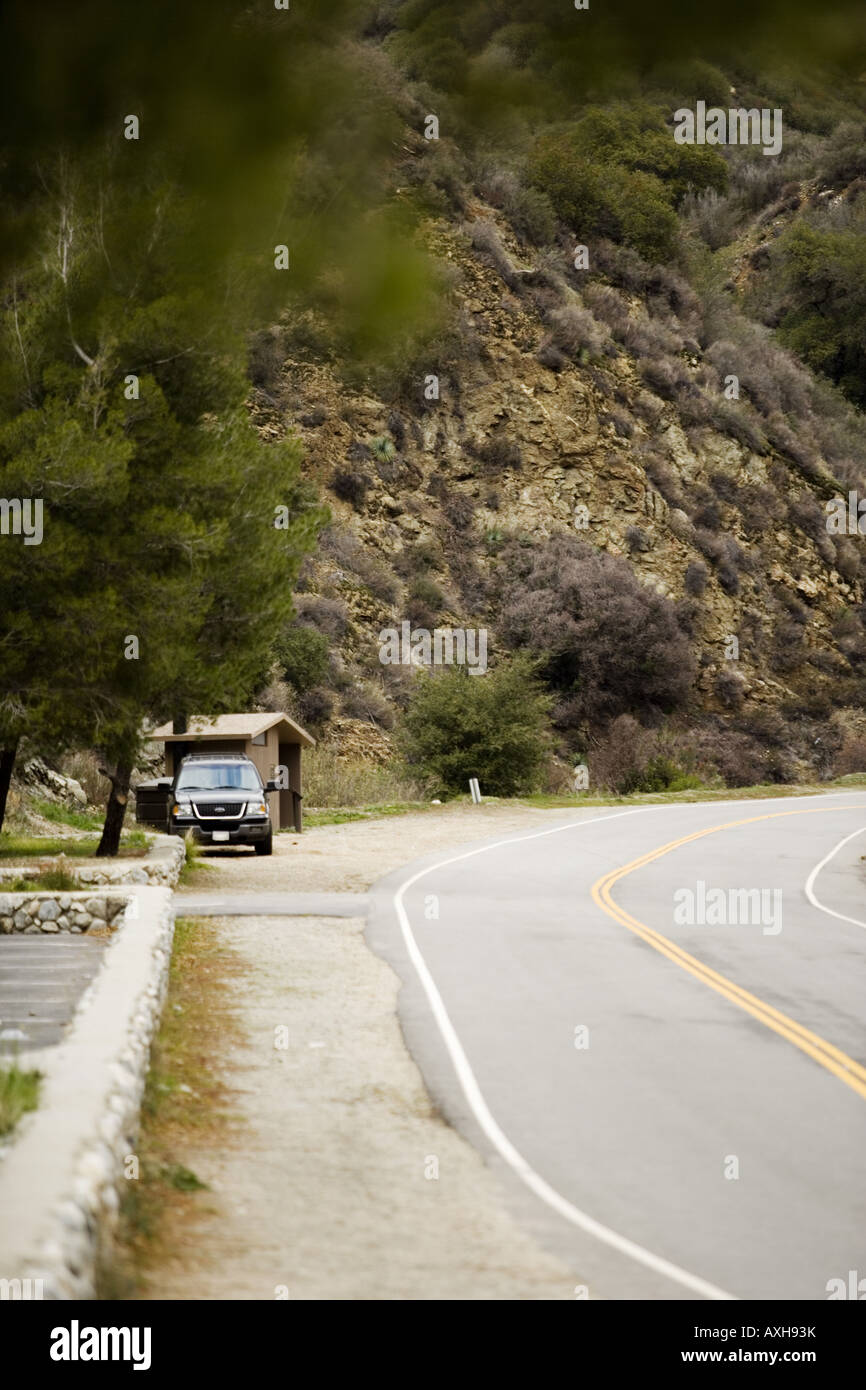 Car parked alongside rural road Stock Photo - Alamy