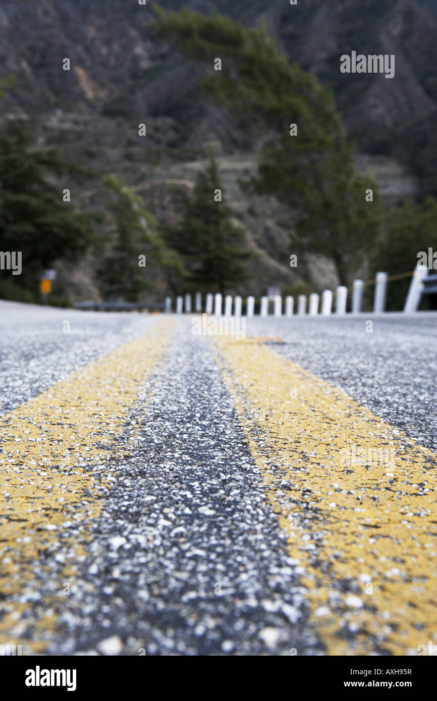 Close up view of paved mountain road Stock Photo - Alamy
