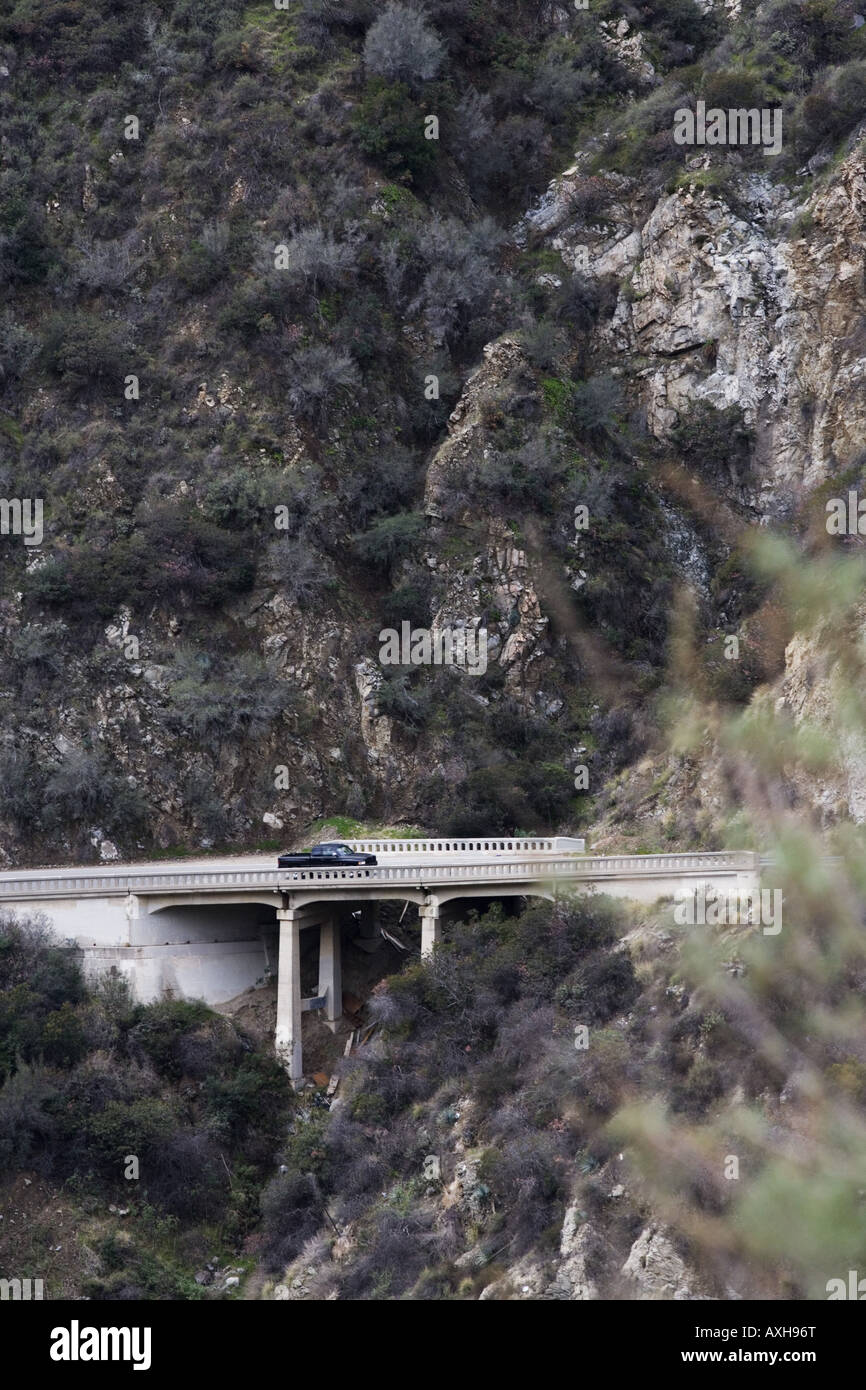 Truck crossing bridge in mountains Stock Photo - Alamy