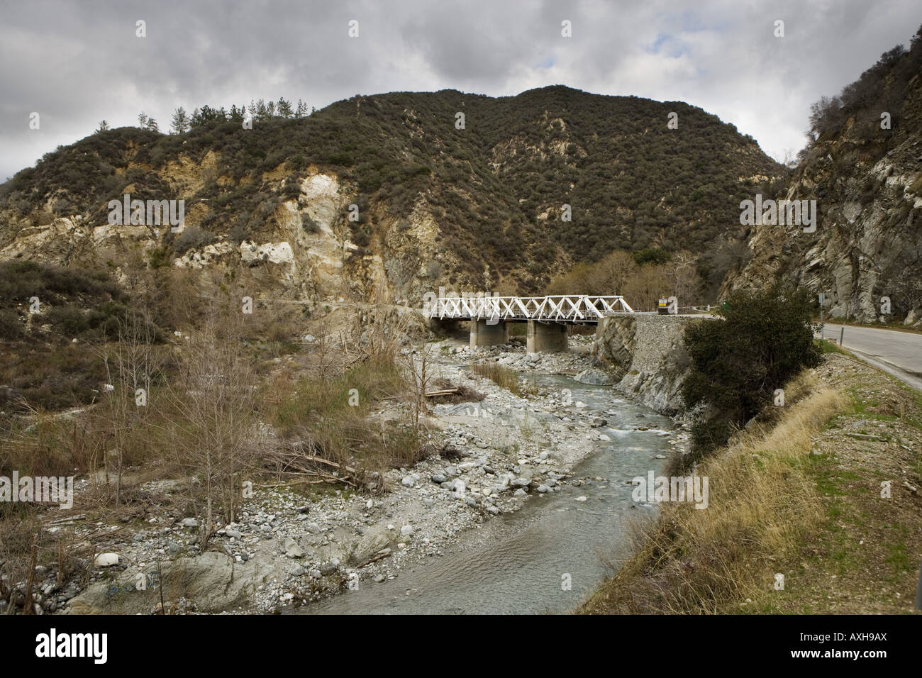 Bridge crossing stream on mountain road Stock Photo - Alamy
