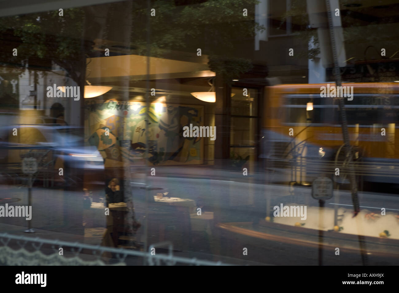 Reflection of traffic in restaurant window Stock Photo - Alamy