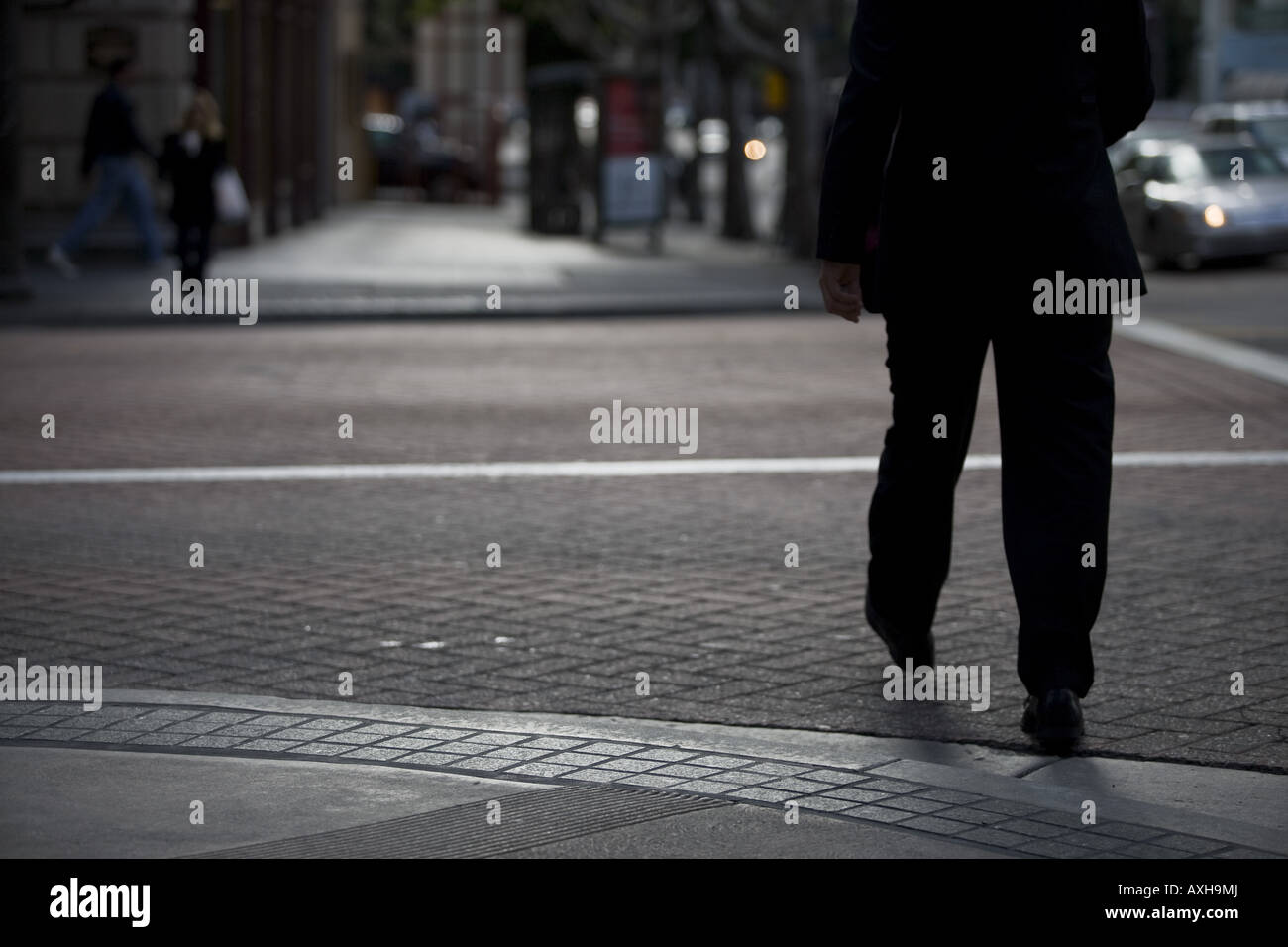 Man crossing street Stock Photo - Alamy