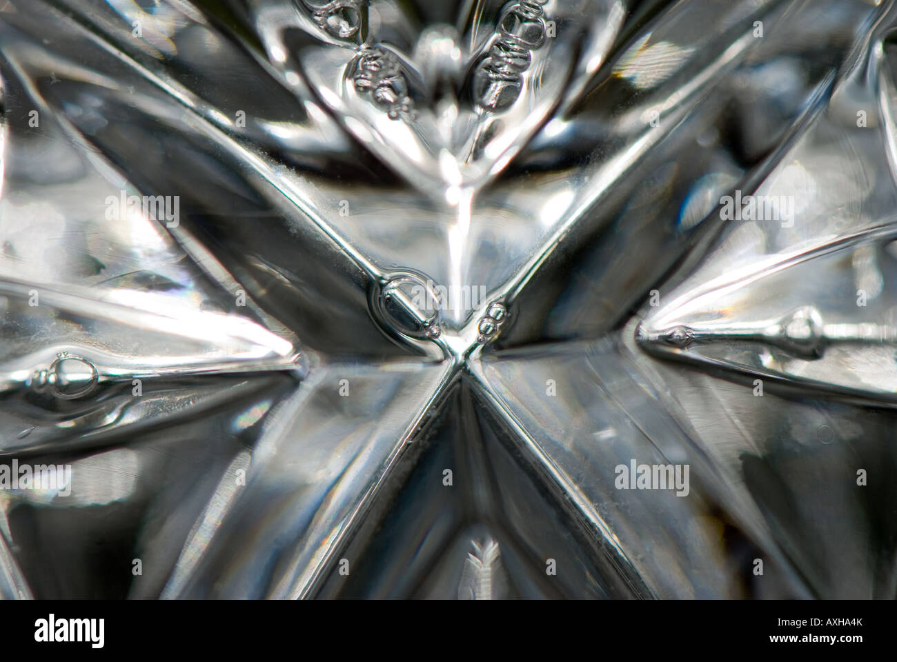 Close-up of cut glass with dark reflection and bubbles Stock Photo - Alamy