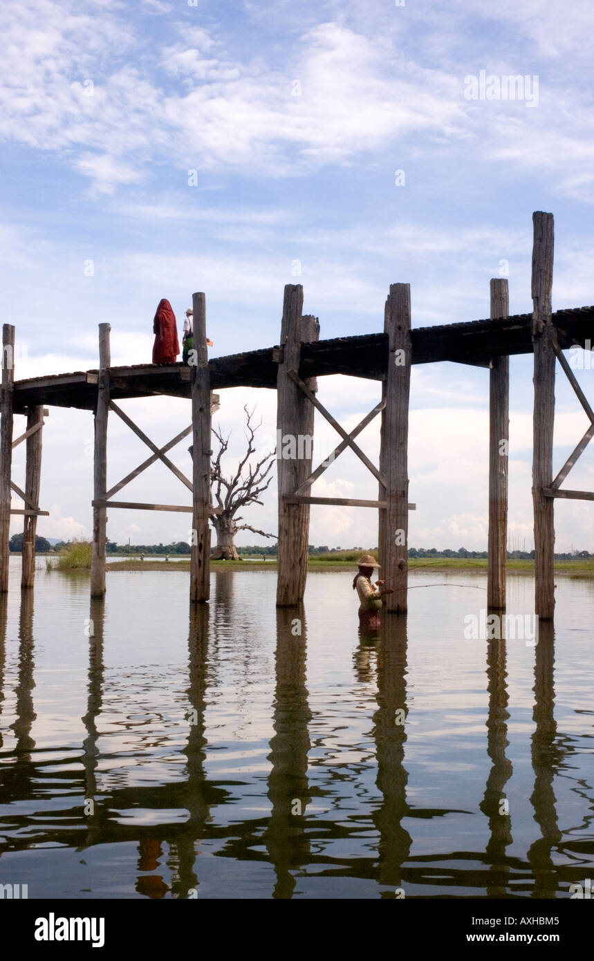 Stock photograph of the U Bein old teak bridge across Taungthaman Lake ...