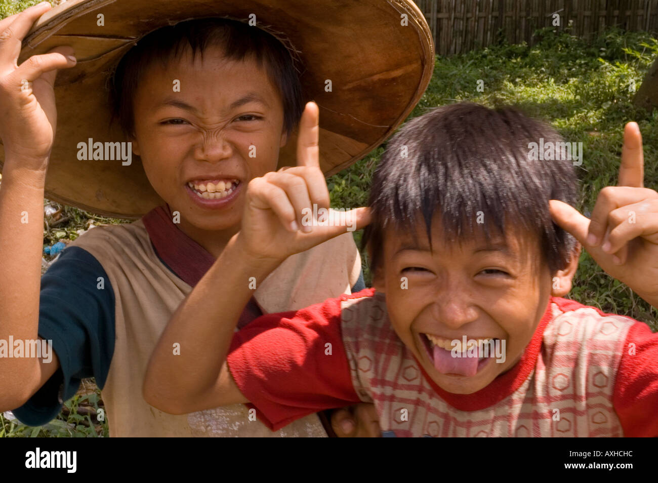 Stock photograph of two boys making funny faces in Myanmar 2006 Stock ...