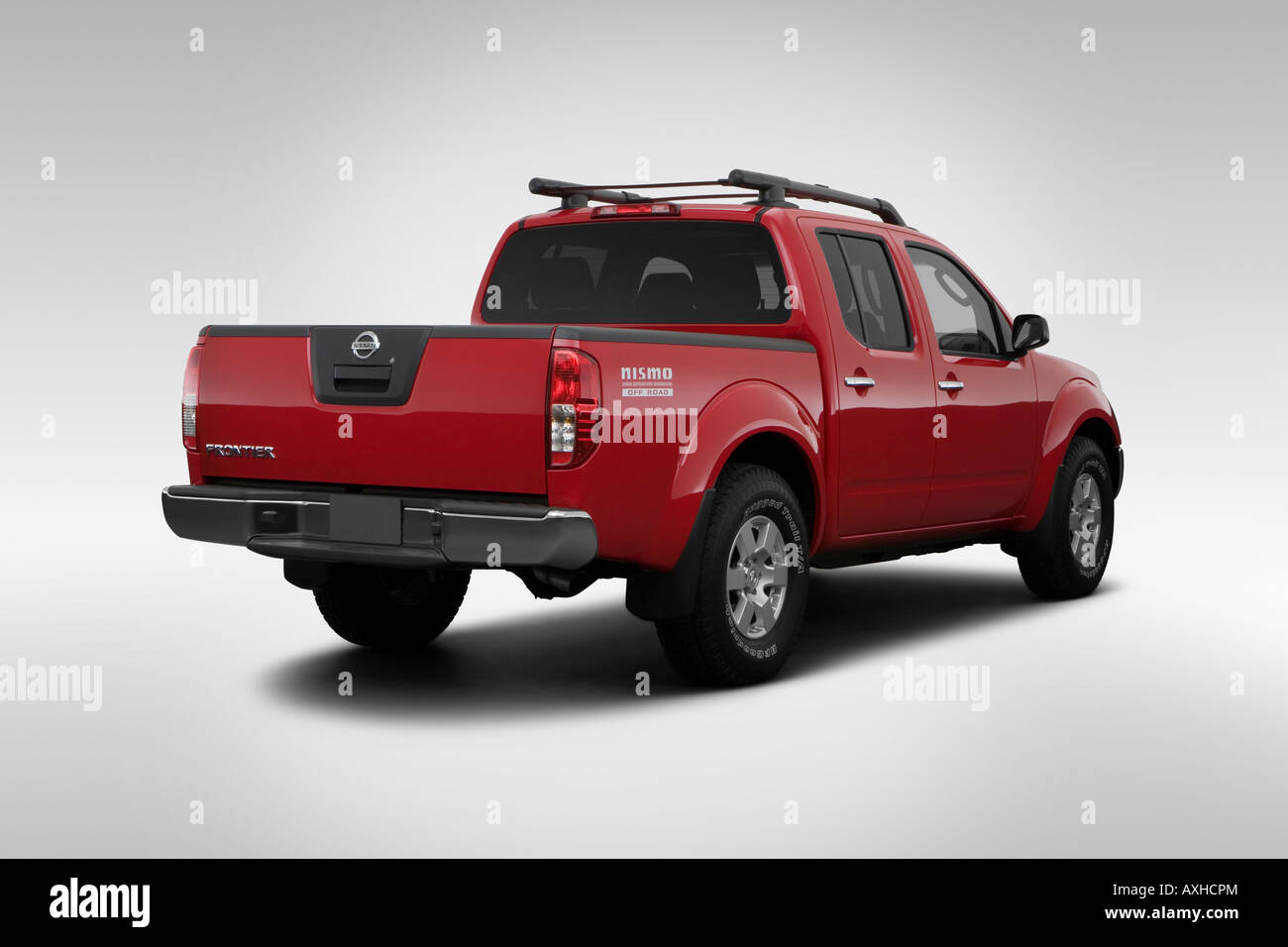 2008 Nissan Frontier Nismo in Red - Rear angle view Stock Photo - Alamy