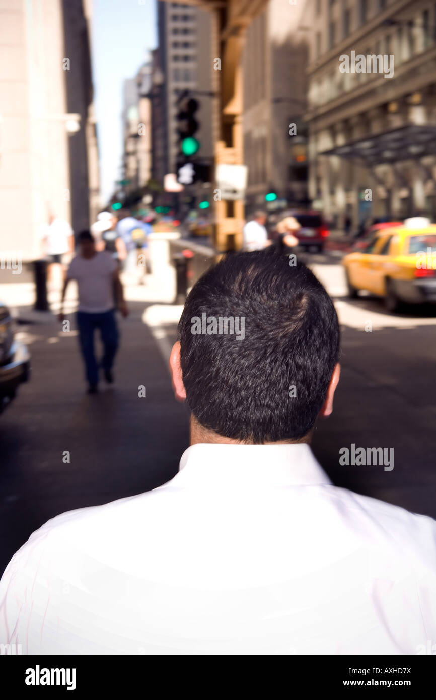 Waiting for traffic light green man to cross the road hi-res stock ...