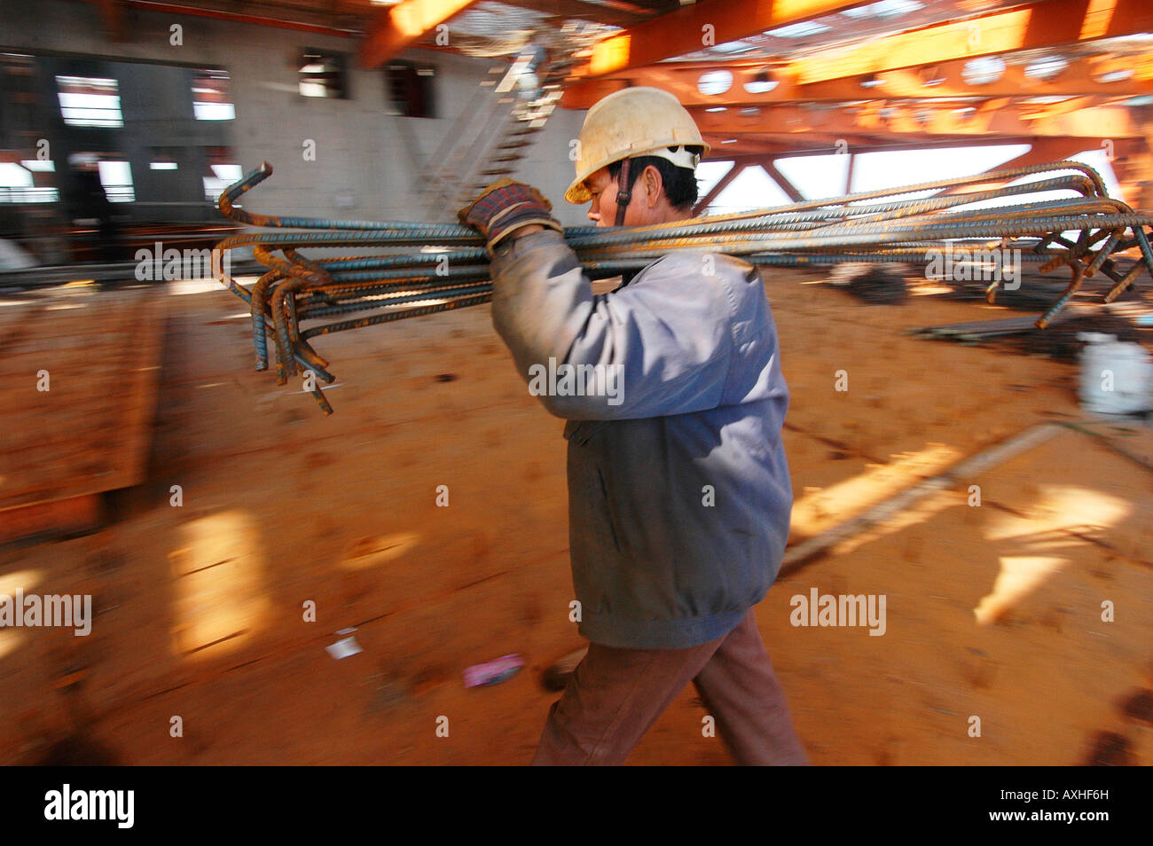 A construction worker at the Shanghai World Financial Center, China ...