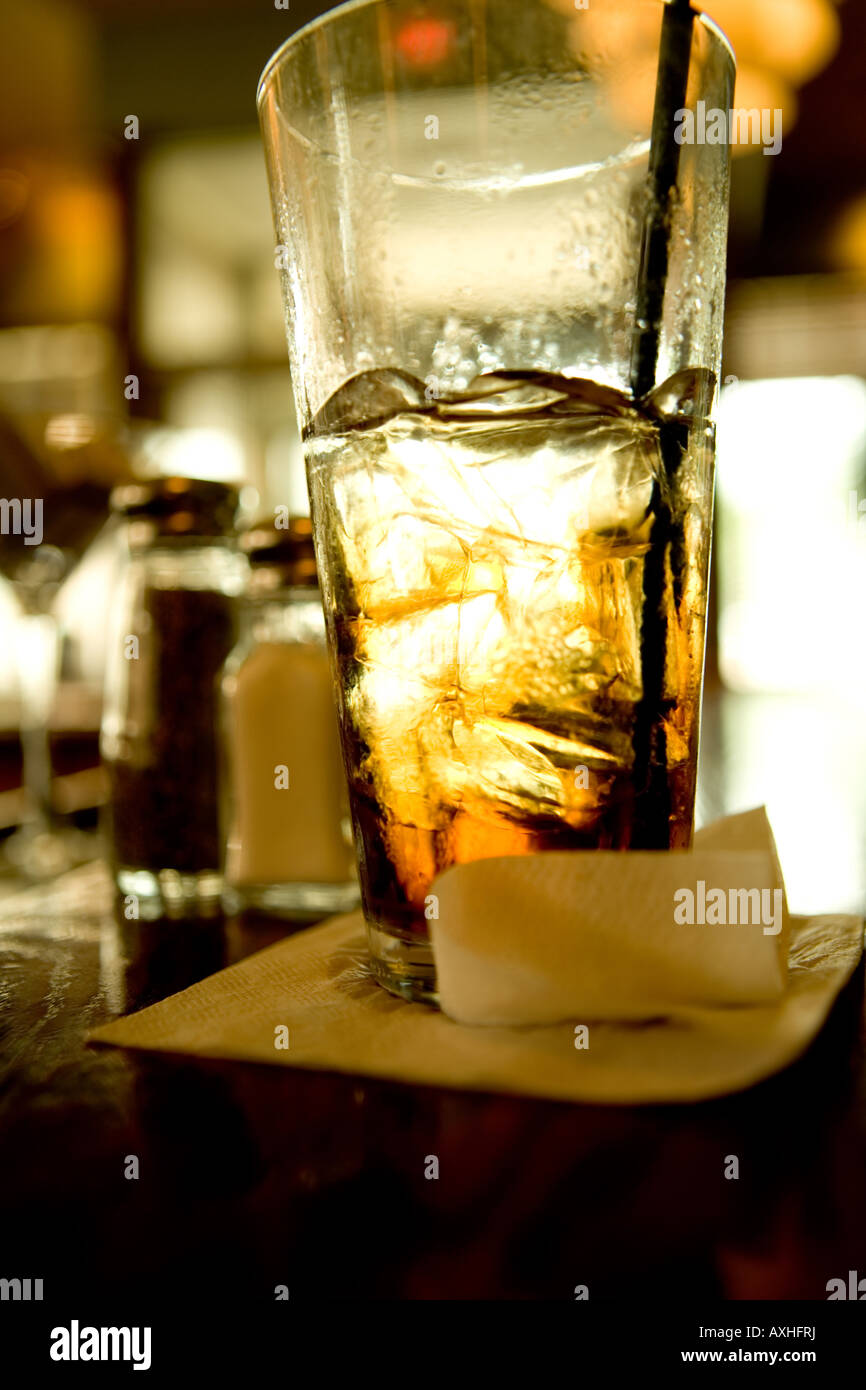 Coke with ice cubes in a glass Stock Photo - Alamy