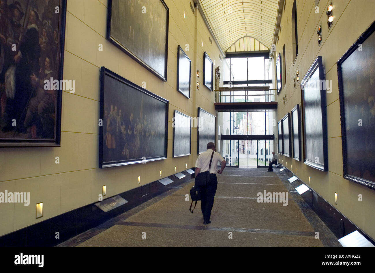 man visiting painting exhibition in Amsterdam Stock Photo - Alamy