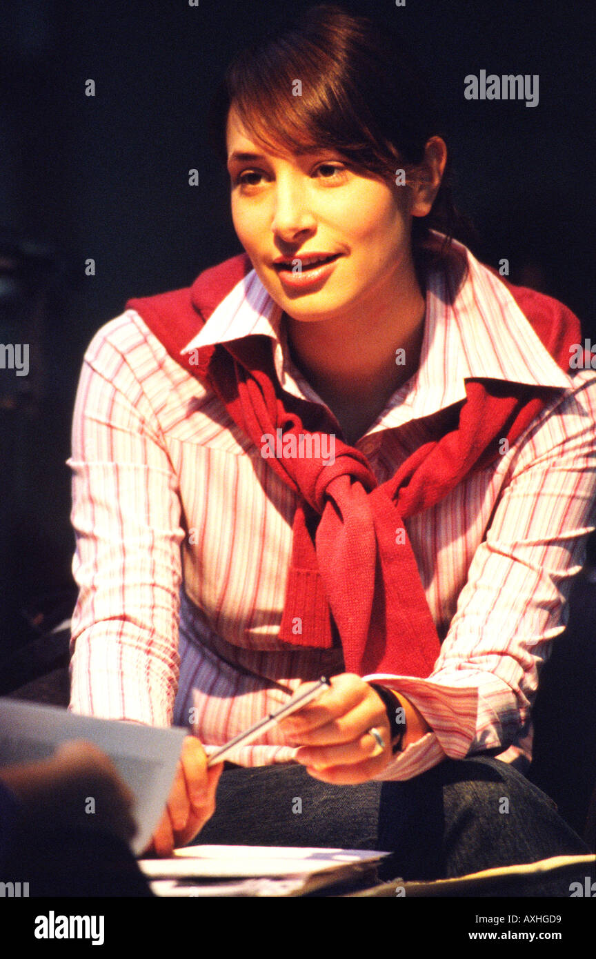 Young journalist doing interview with someone Stock Photo - Alamy