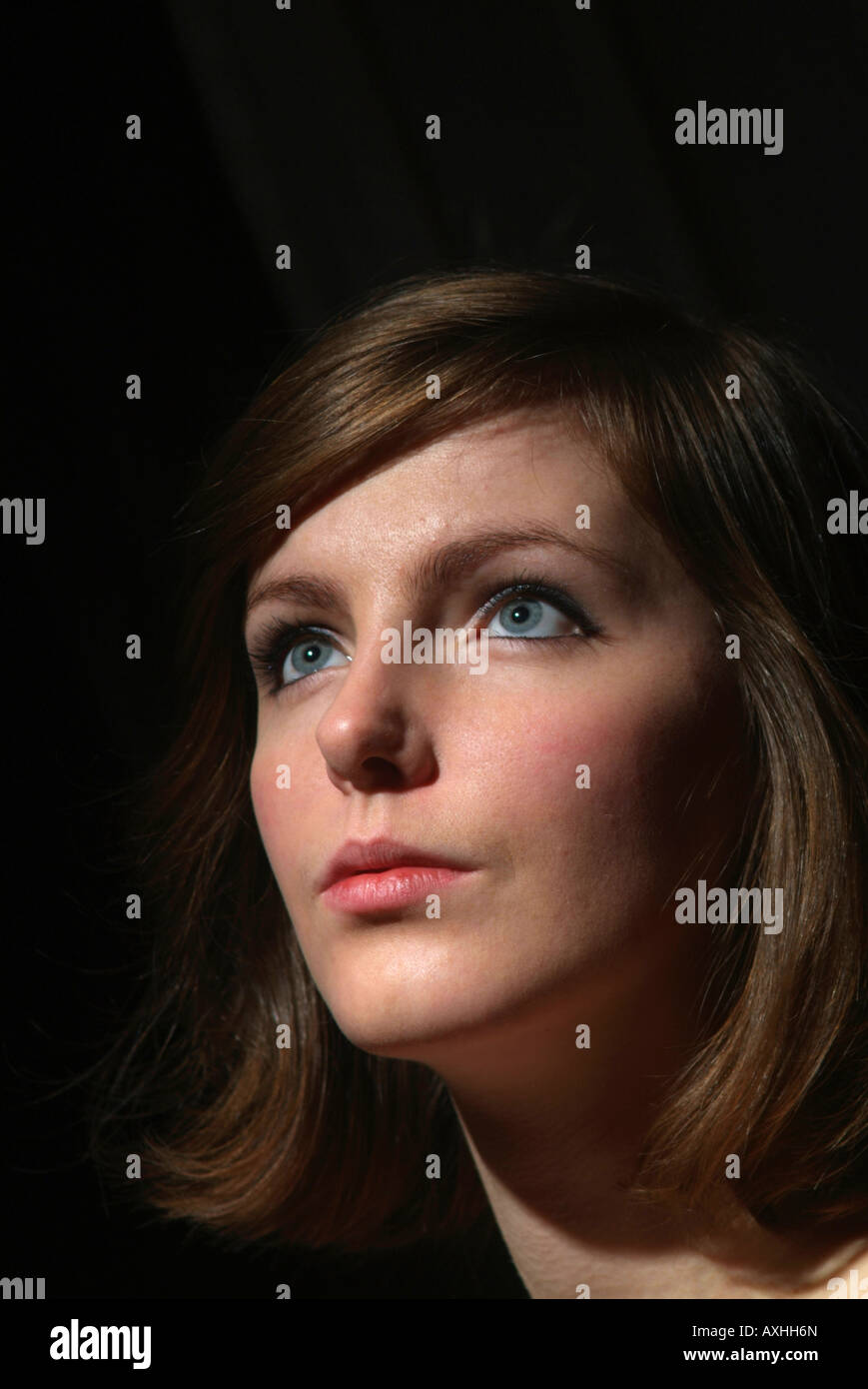 A low key headshot picture of beautiful woman Stock Photo - Alamy