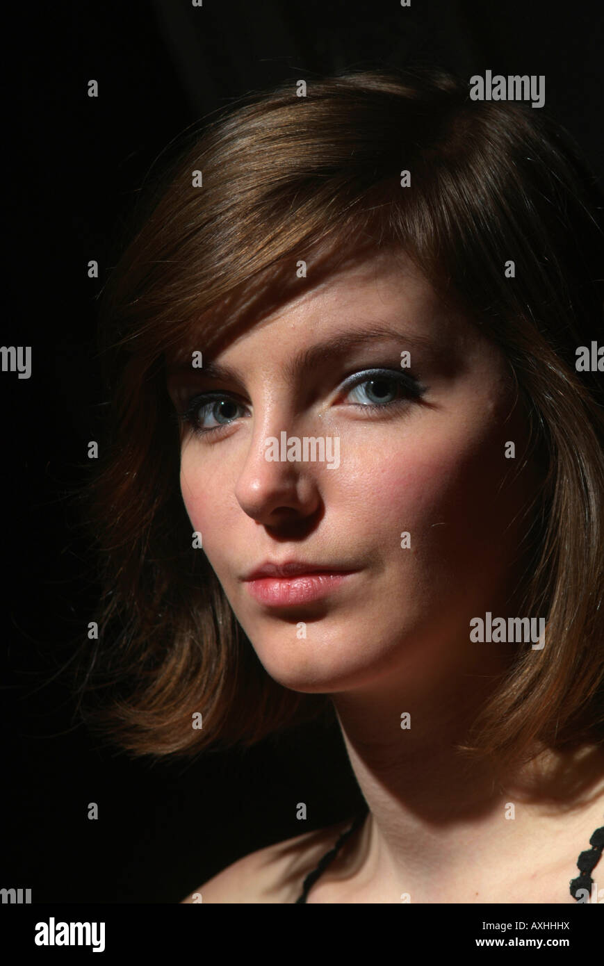 A low key headshot picture of beautiful woman Stock Photo - Alamy