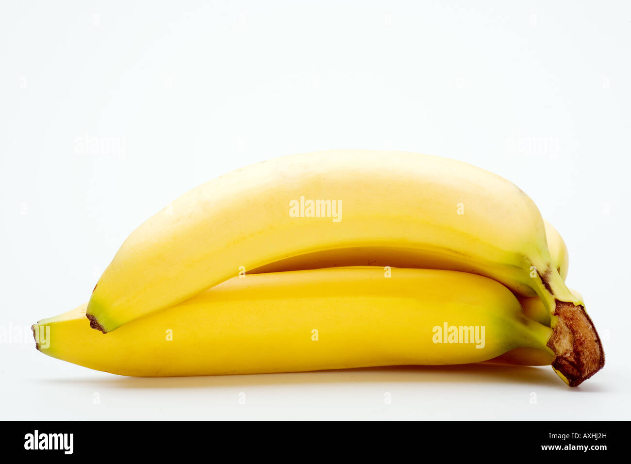 banana bundle isolated on white background Stock Photo - Alamy