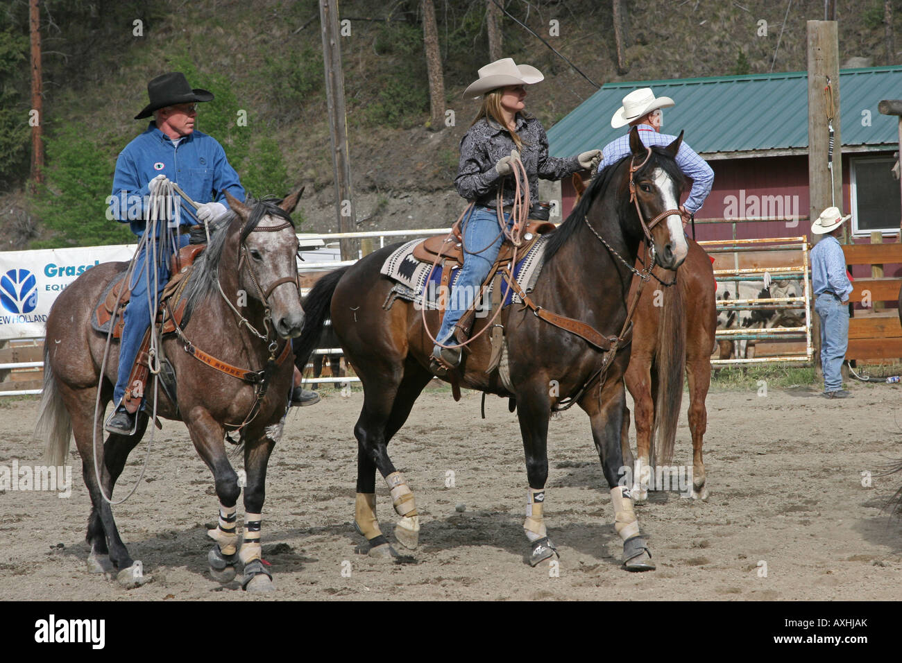 Cowboys and a cowgirl at a Canadian rodeo Stock Photo - Alamy