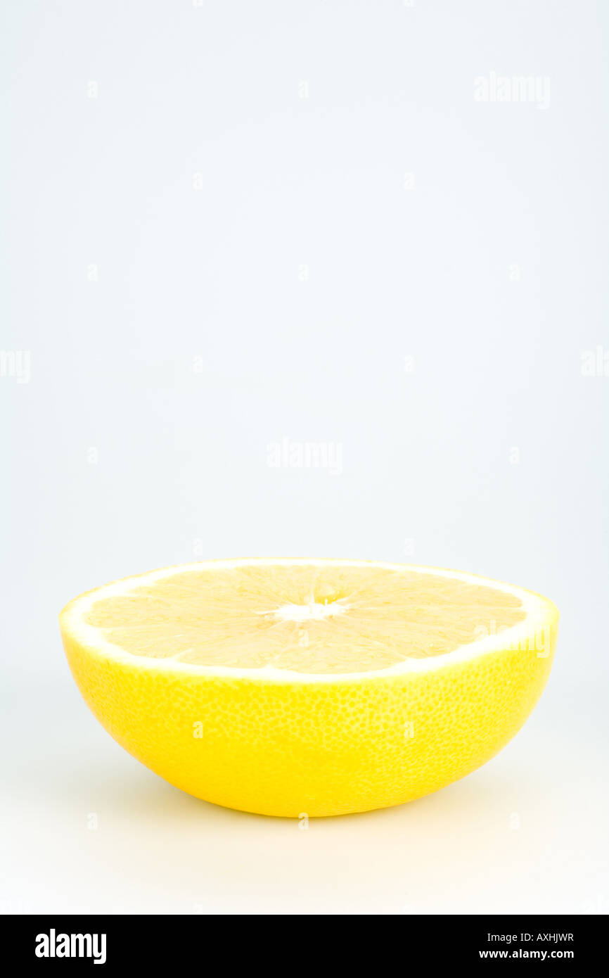 sliced grapefruit isolated on white Stock Photo - Alamy