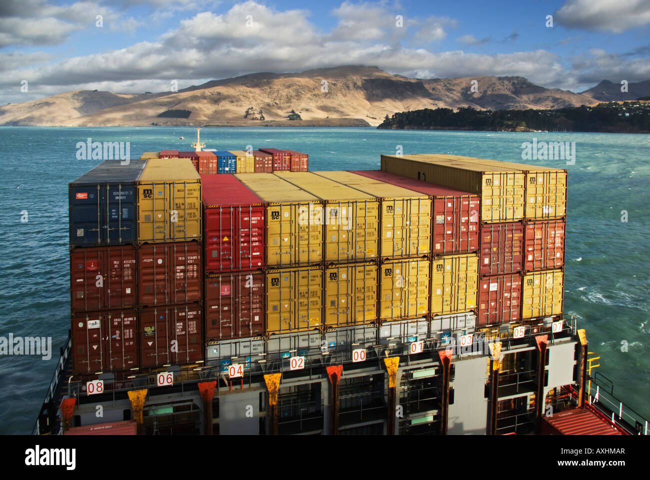 Stacks of containers on the deck of a container ship sailing from ...