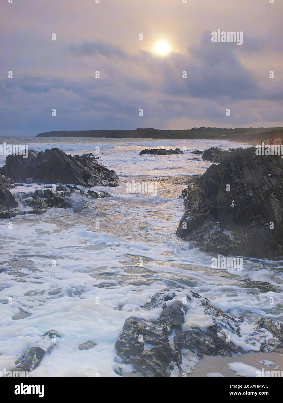 evening sun sinks low in sky as stormclouds gather Stock Photo - Alamy