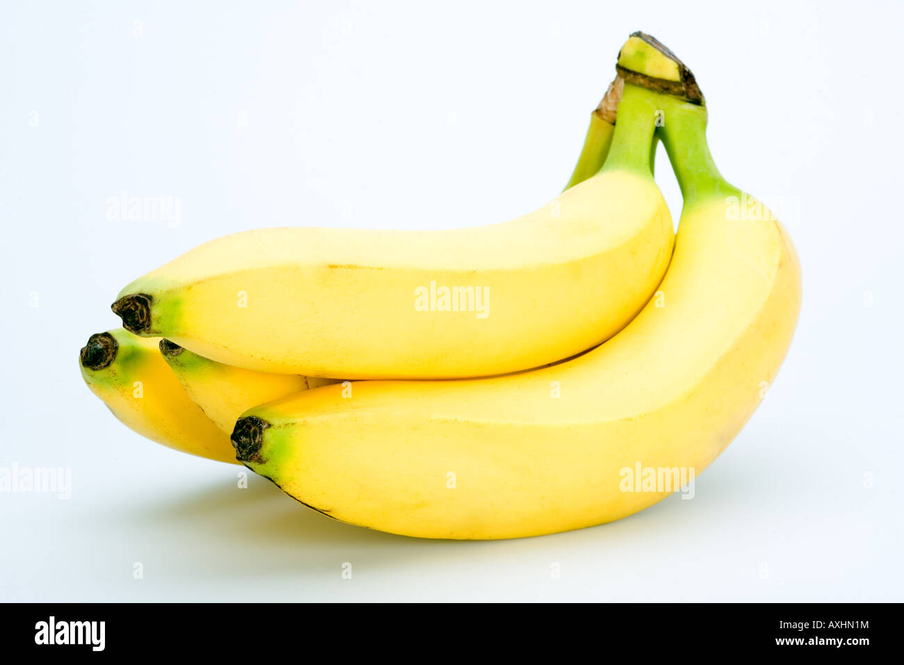 banana bundle isolated on white background Stock Photo - Alamy