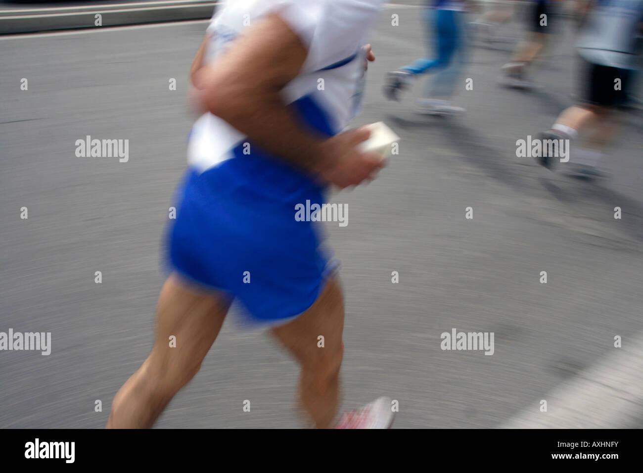 runners in road race Stock Photo - Alamy