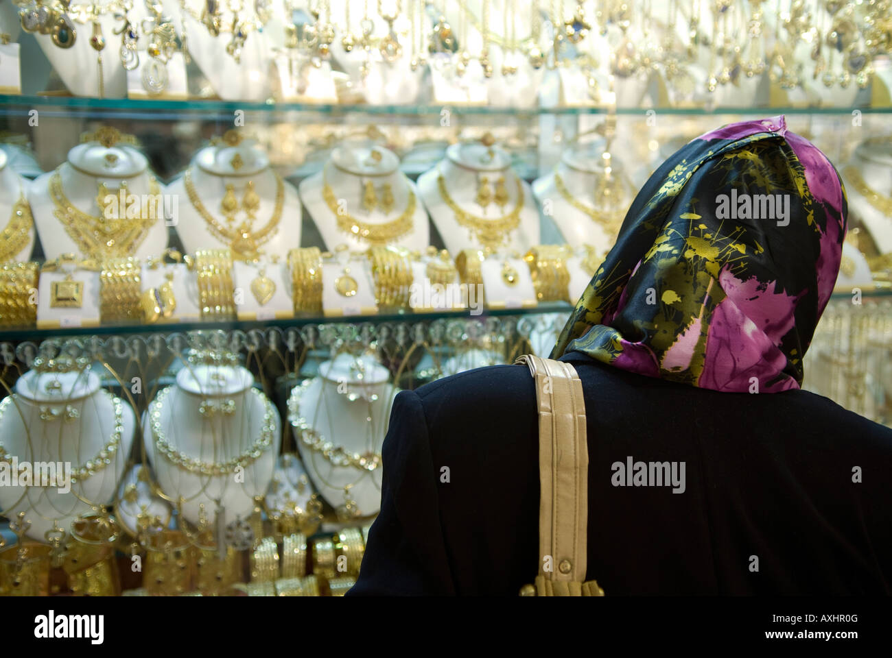 Libyan woman browsing jewellery shop in the souq Medina Tripoli Libya ...