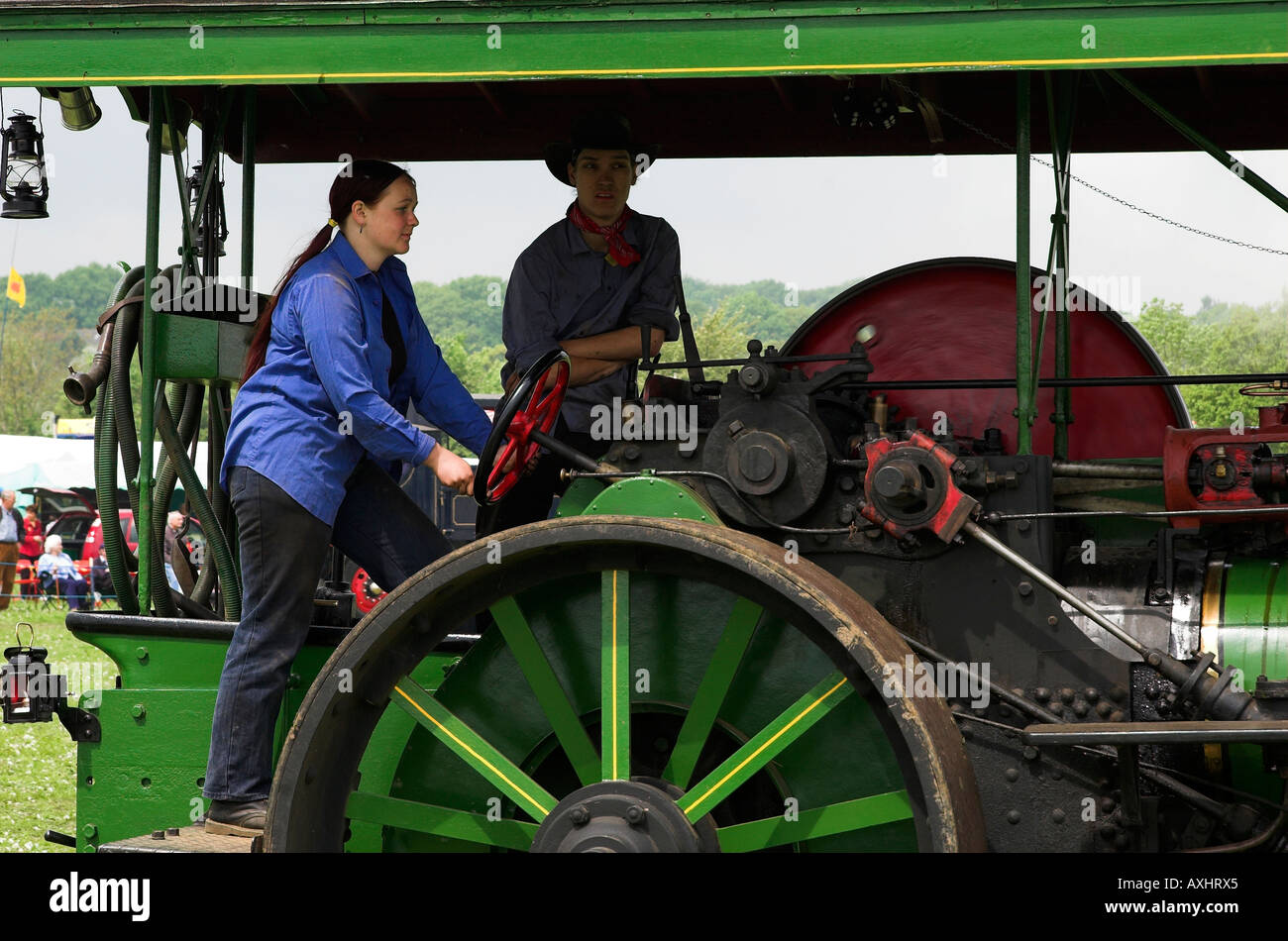Lady driver at the controls of a steam traction engine Stock Photo - Alamy