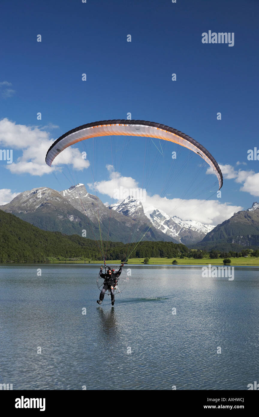 Paramotor skimming water Diamond Lake Paradise near Glenorchy ...