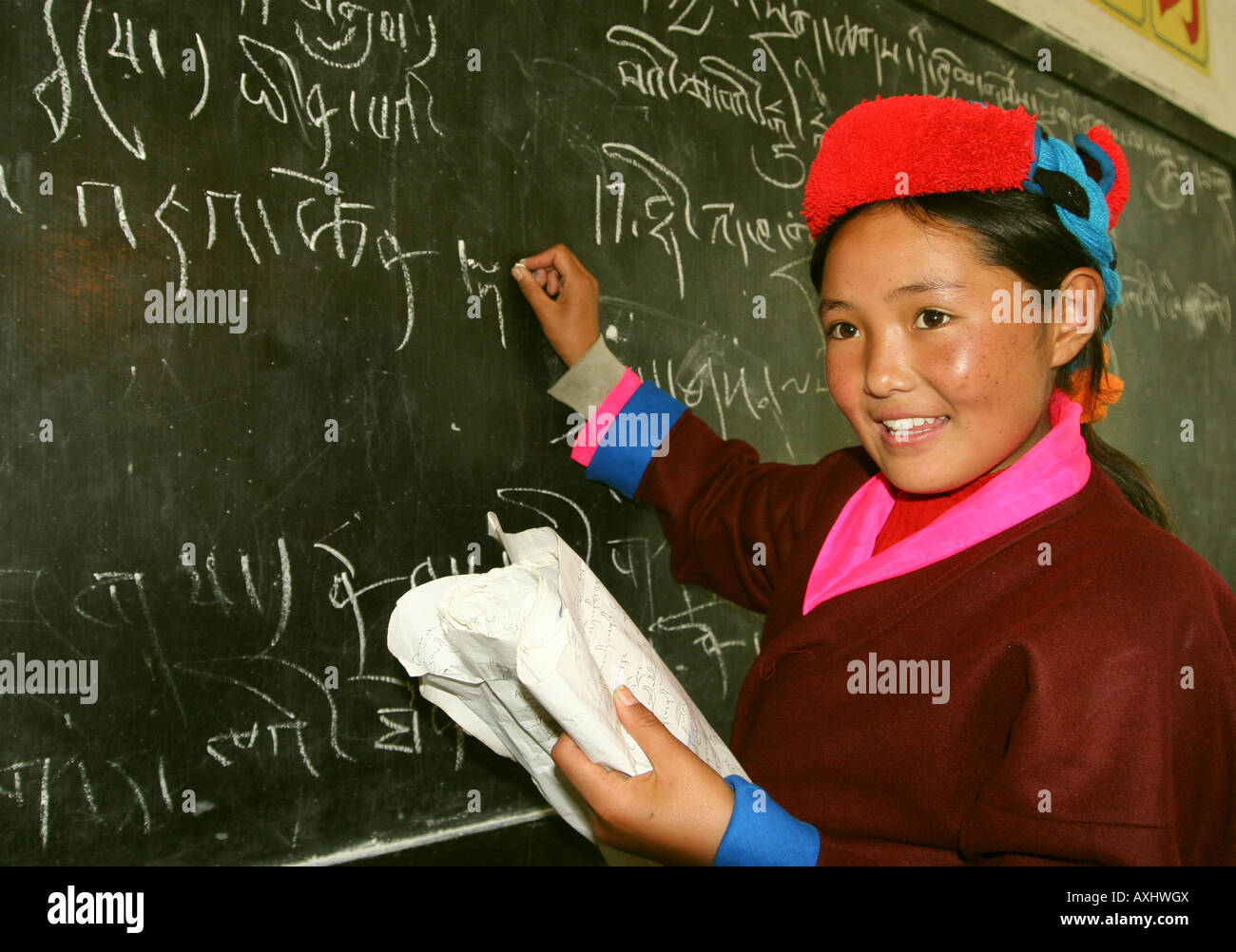 A Tibetan teacher teach tibetan lessons Stock Photo - Alamy