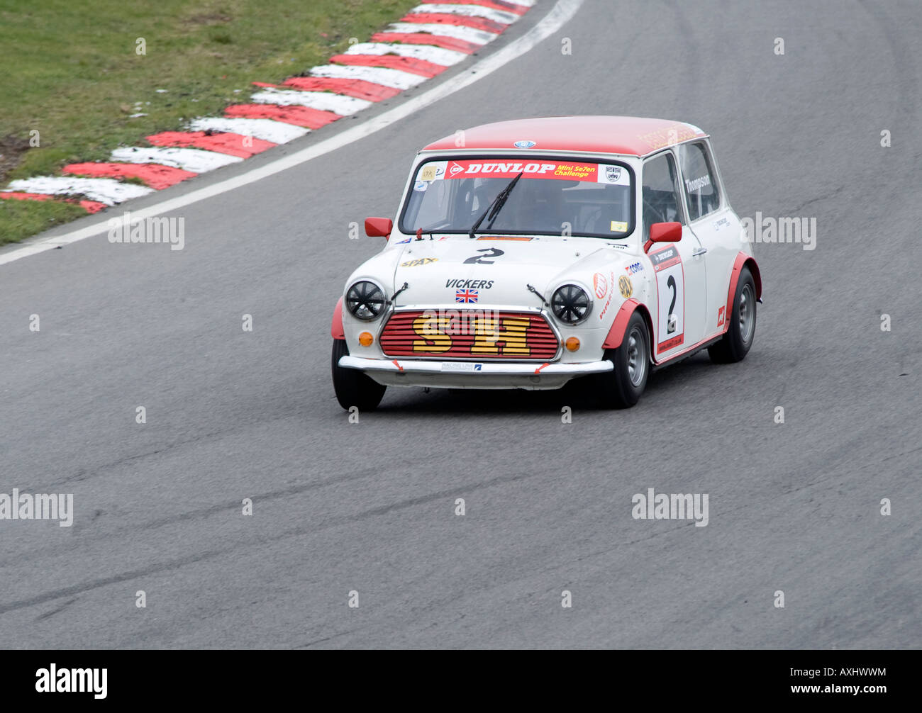 Classic Austin MIni on race track Stock Photo - Alamy