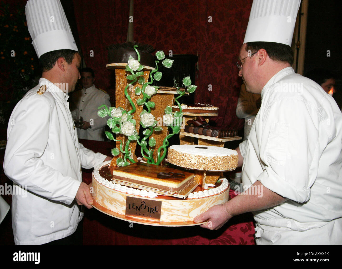 Chefs bring out a cake during a banquet in honour of UNESCO's Goodwill ...