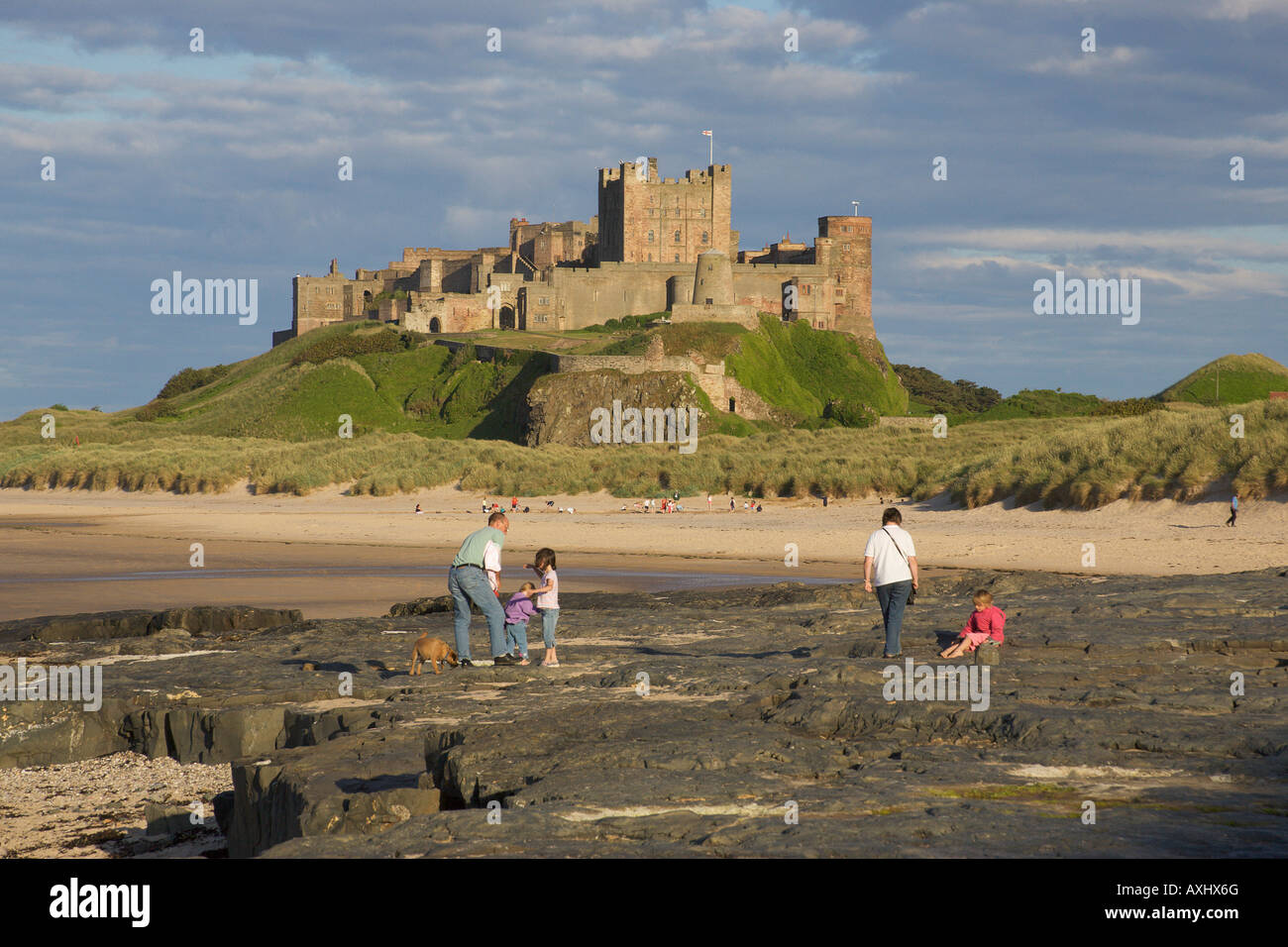 Bamburgh beach family hi-res stock photography and images - Alamy