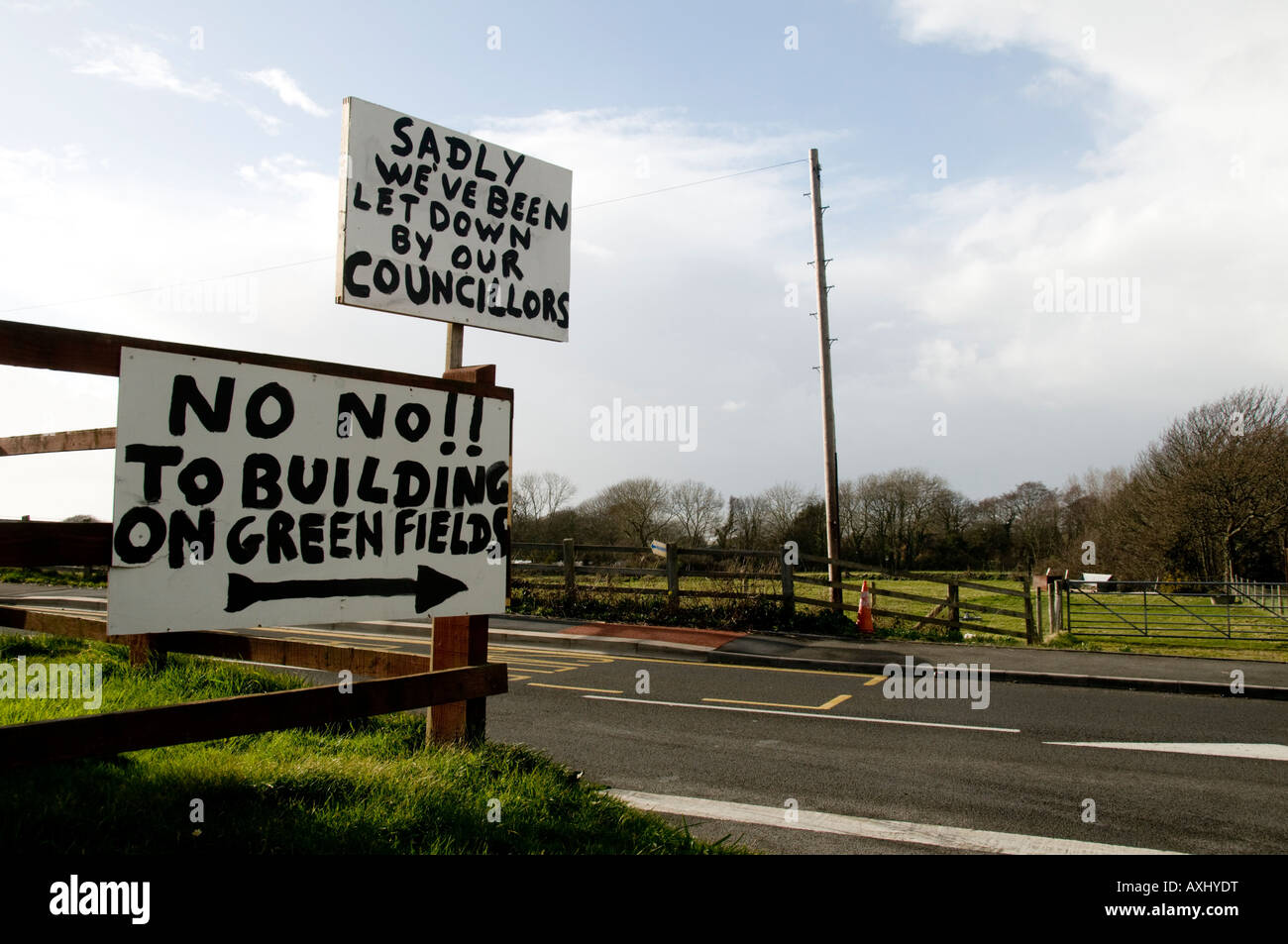 Handwritten signs put up by local residents opposing new housing ...