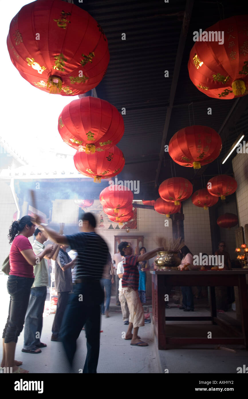Chinese man praying at goddess mercy hi-res stock photography and ...