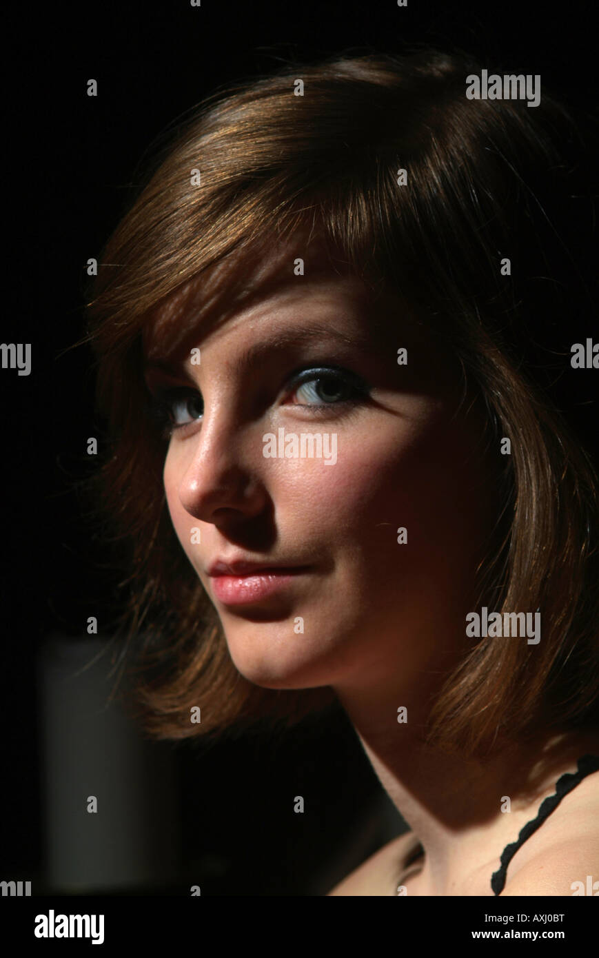 A low key headshot picture of beautiful woman Stock Photo - Alamy