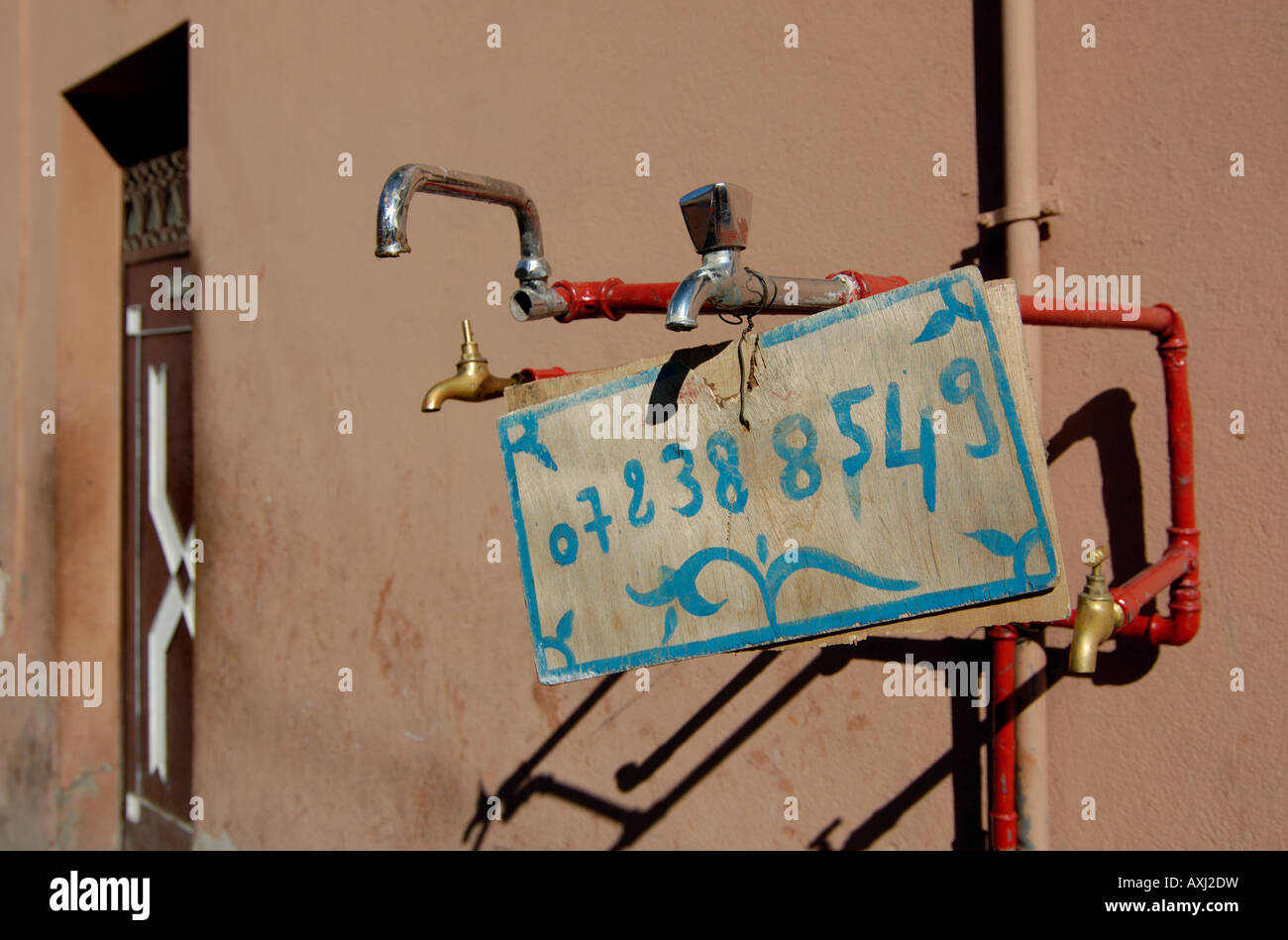 A collection of taps advertising plumbing Marrakech Morocco Stock Photo ...