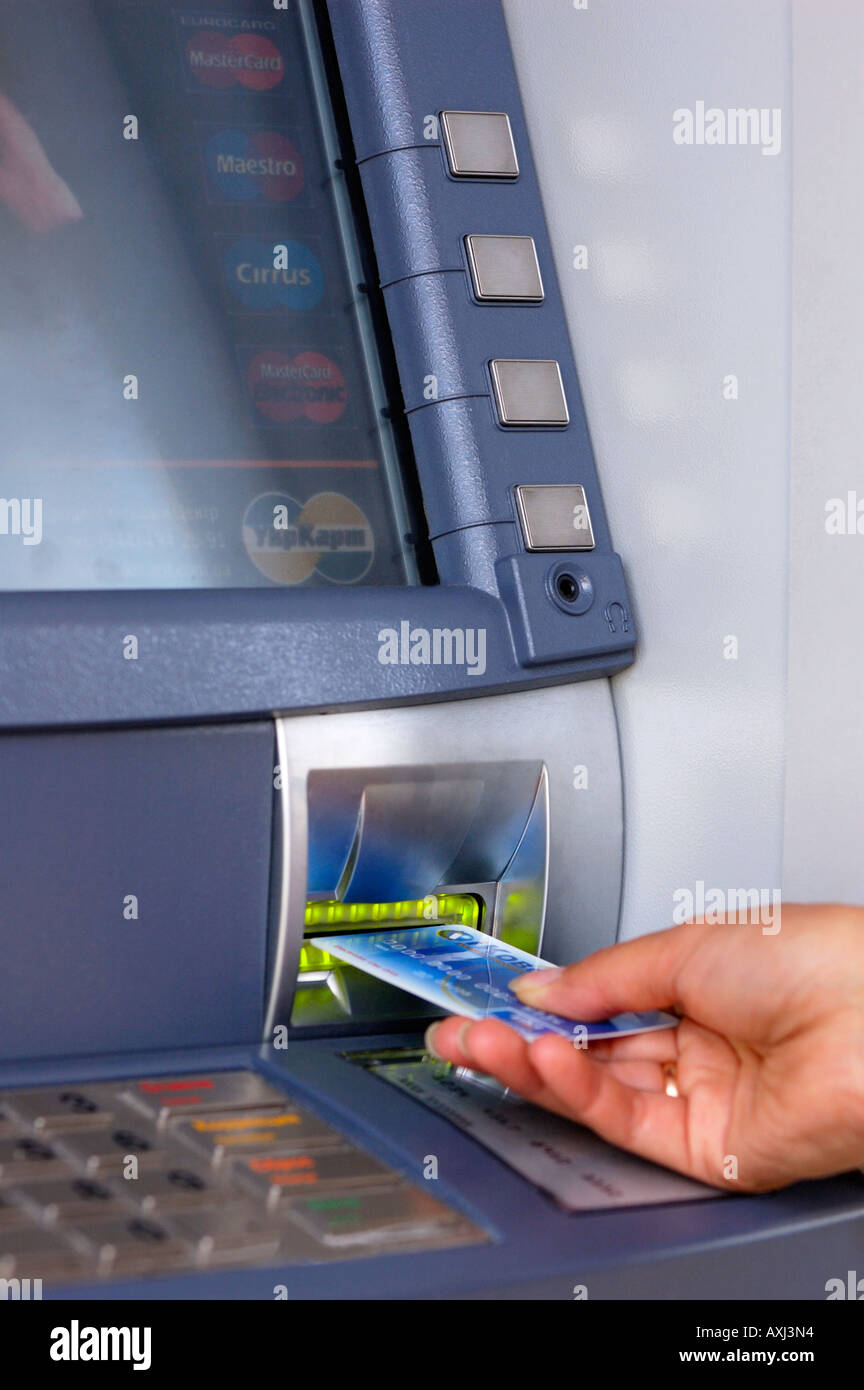Inserting plastic card visa atm hi-res stock photography and images - Alamy
