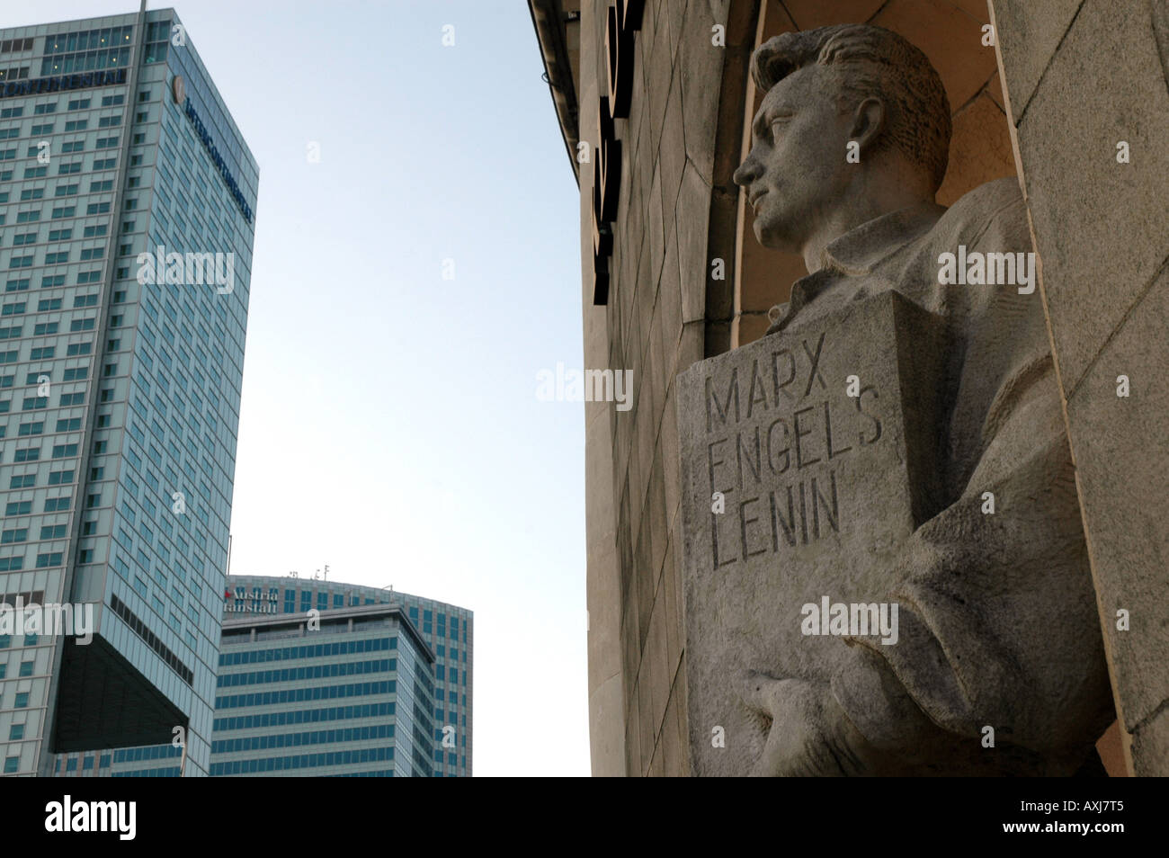 Figure of man holding Marks and Engel book on Palace of Culture and ...