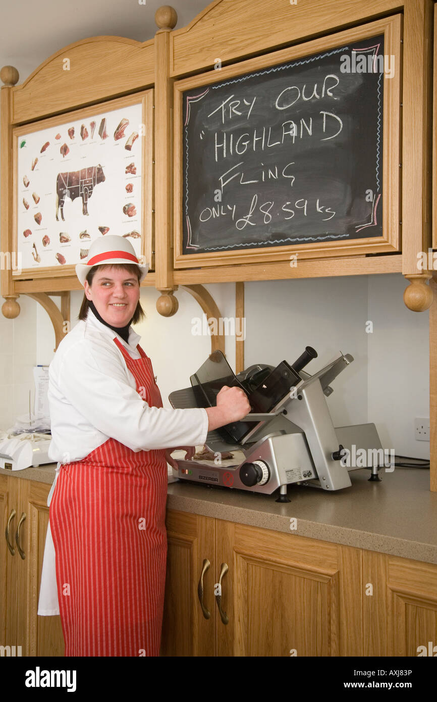 Butcher's Assistant in Shop wearing Red Apron W Irvine Butchers ...