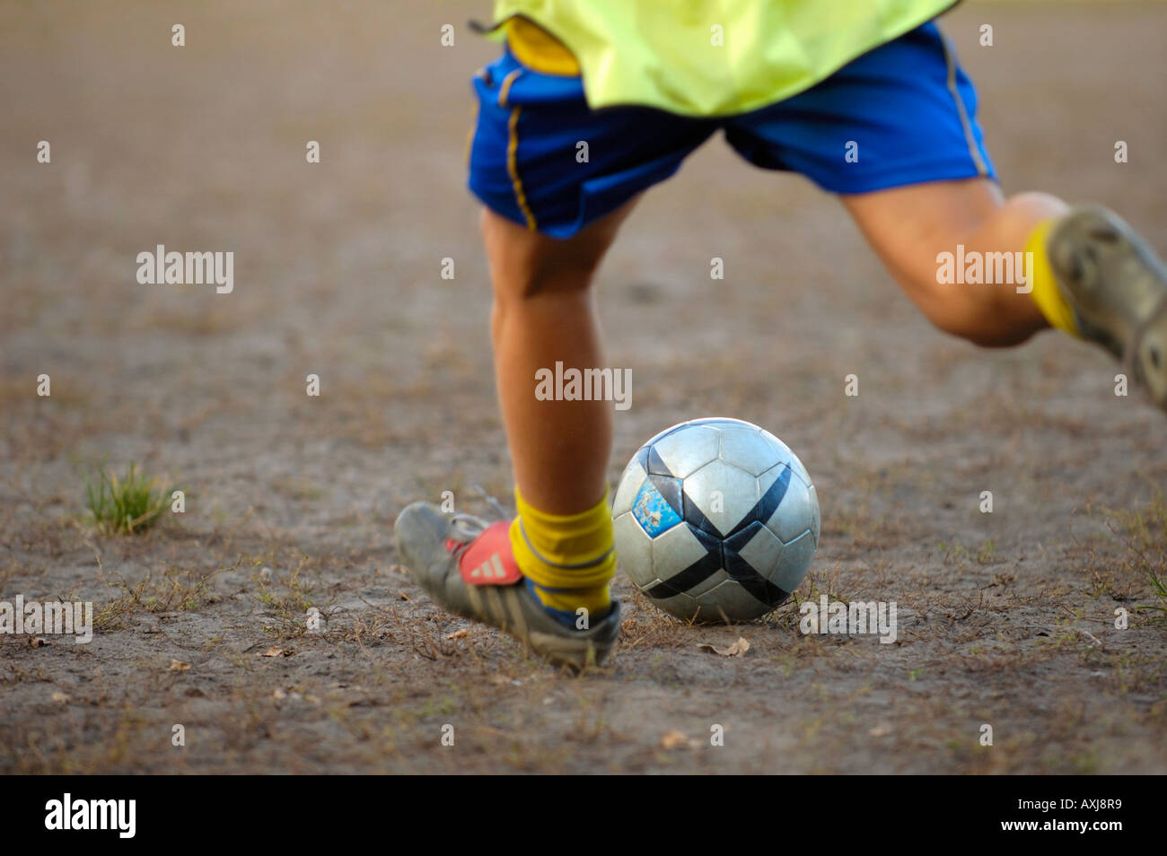 Soccer player with a ball Stock Photo - Alamy