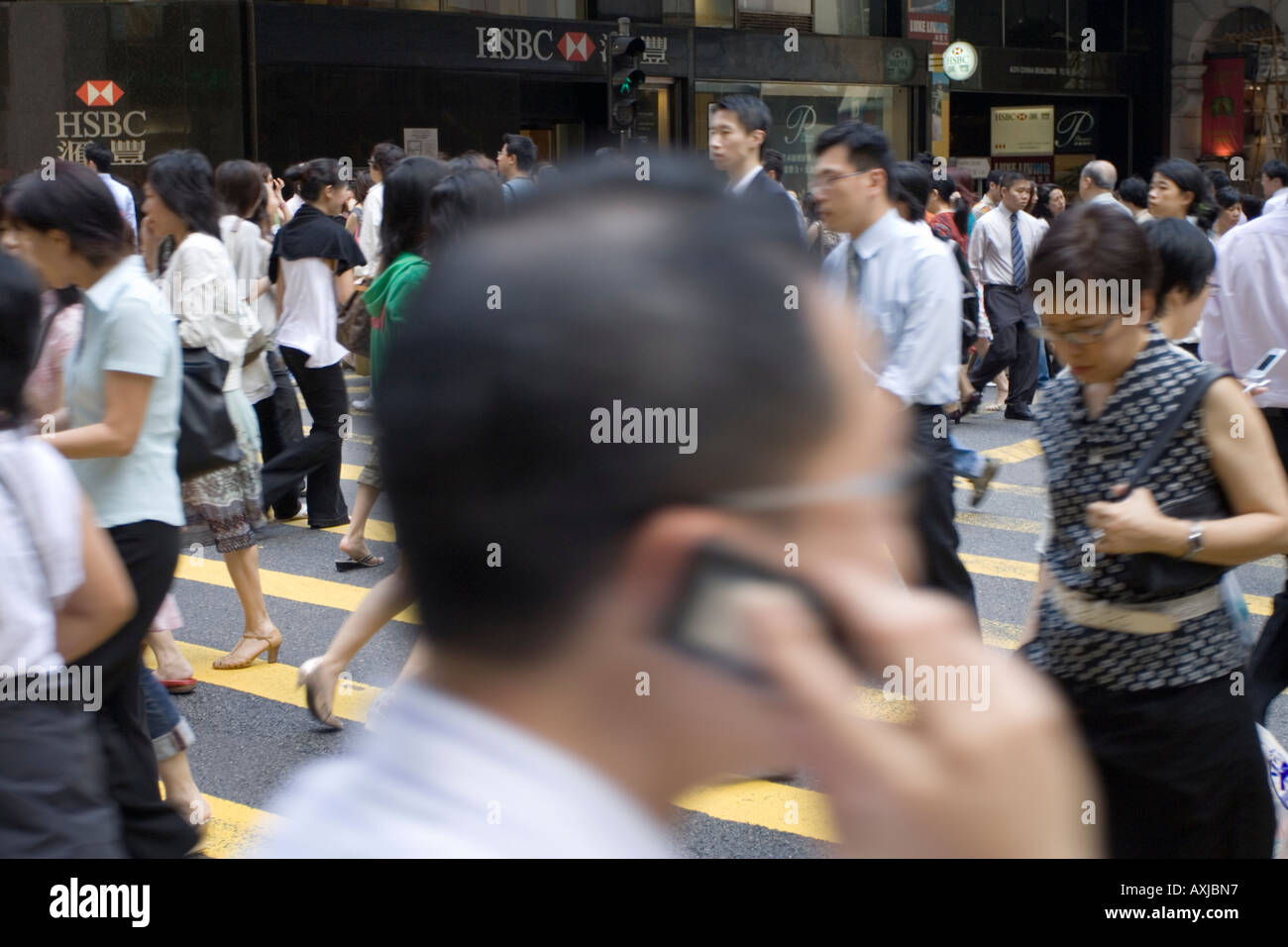 Crowds of people man talking on Cell phone mobile Stock Photo - Alamy