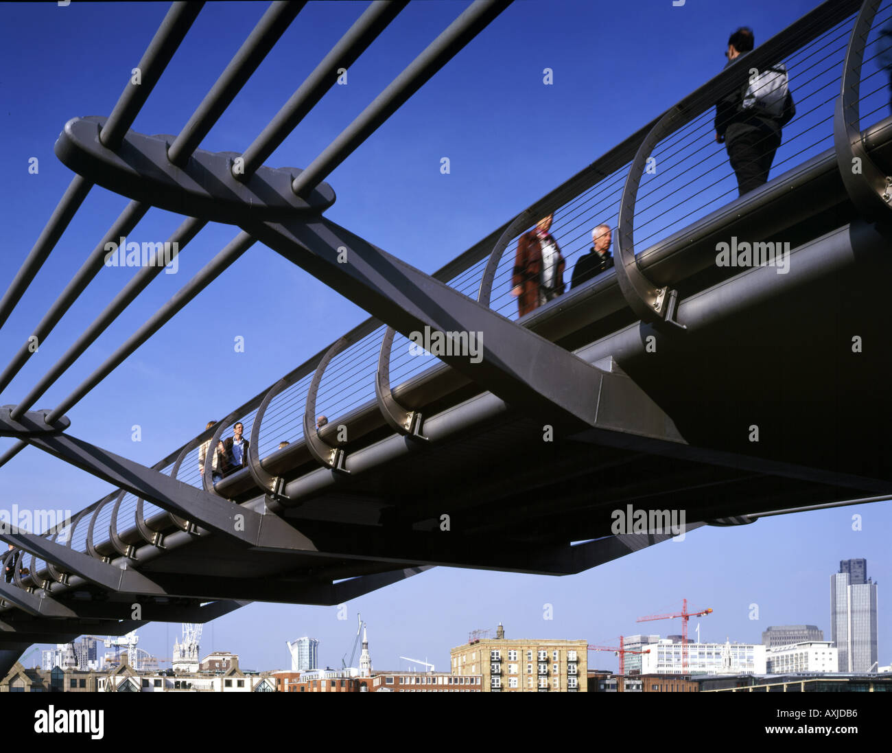 Three women crossing bridge hi-res stock photography and images - Alamy