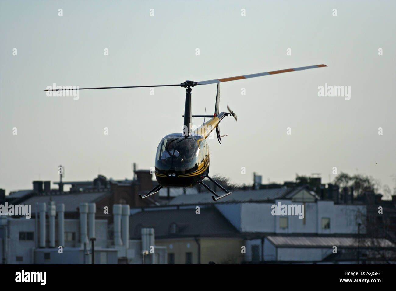 a low flying helicopter in Helsinki Stock Photo - Alamy